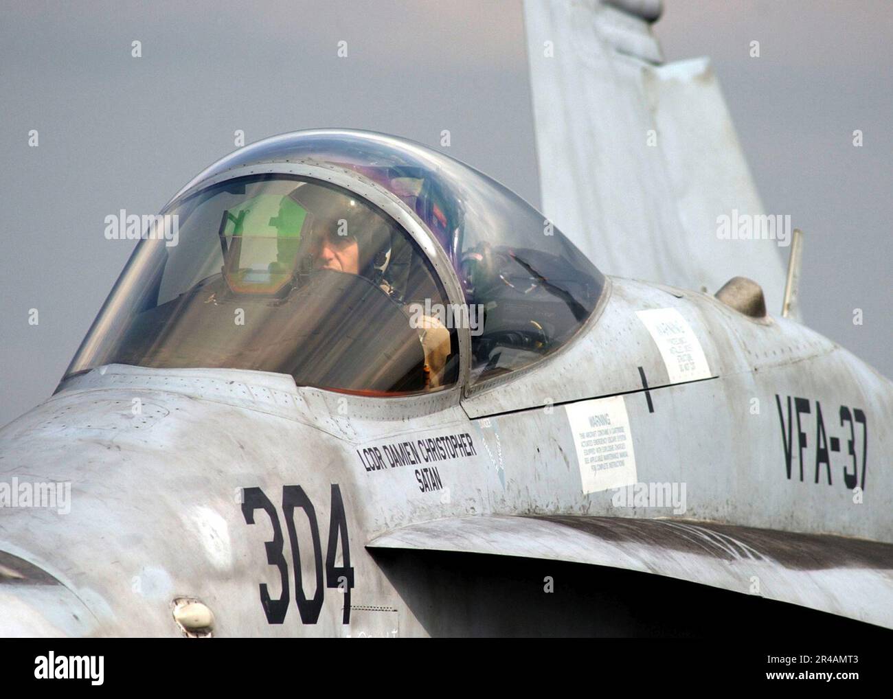 US Navy A Naval Aviator, assigned to the Bulls of Strike Fighter ...