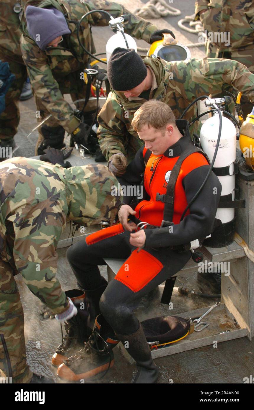 US Navy Ens. Stephen Andros, Dive Officer aboard USS Grapple (ARS 53 ...