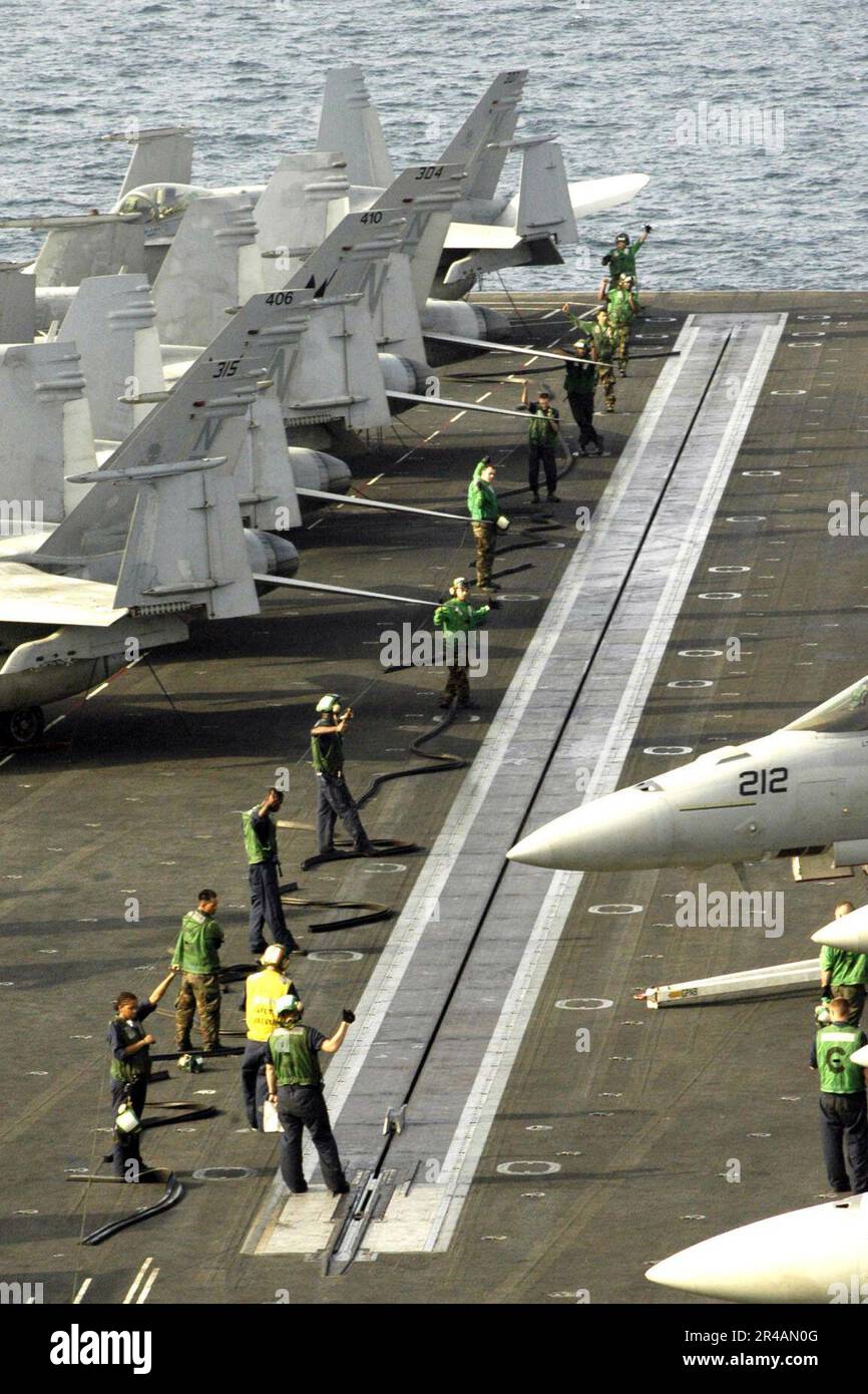 US Navy Air Department personnel conduct a test of one of the four ...
