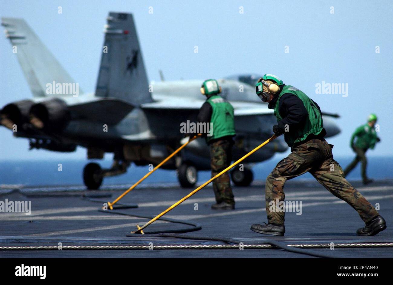 US Navy Sailors assigned to the Air Department aboard USS Harry S ...