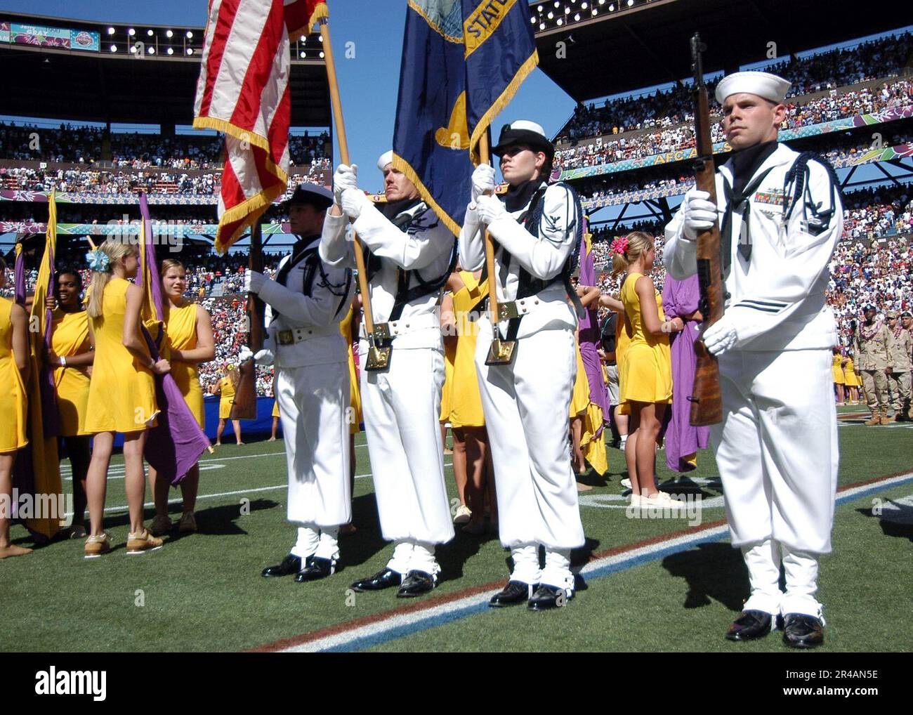 US Navy A Naval Station Pearl Harbor, Hawaii ceremonial color guard parades the colors during ...