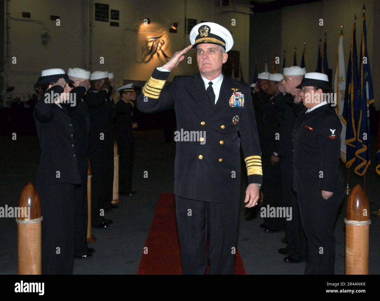 US Navy Adm. John B. Nathman, a native of San Antonio, Texas, is piped ...