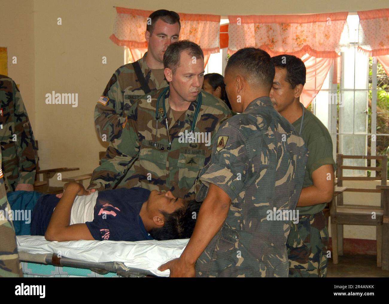 US Navy U.S. Army Maj. Michael Moffatt, center, directs both U.S. Army ...