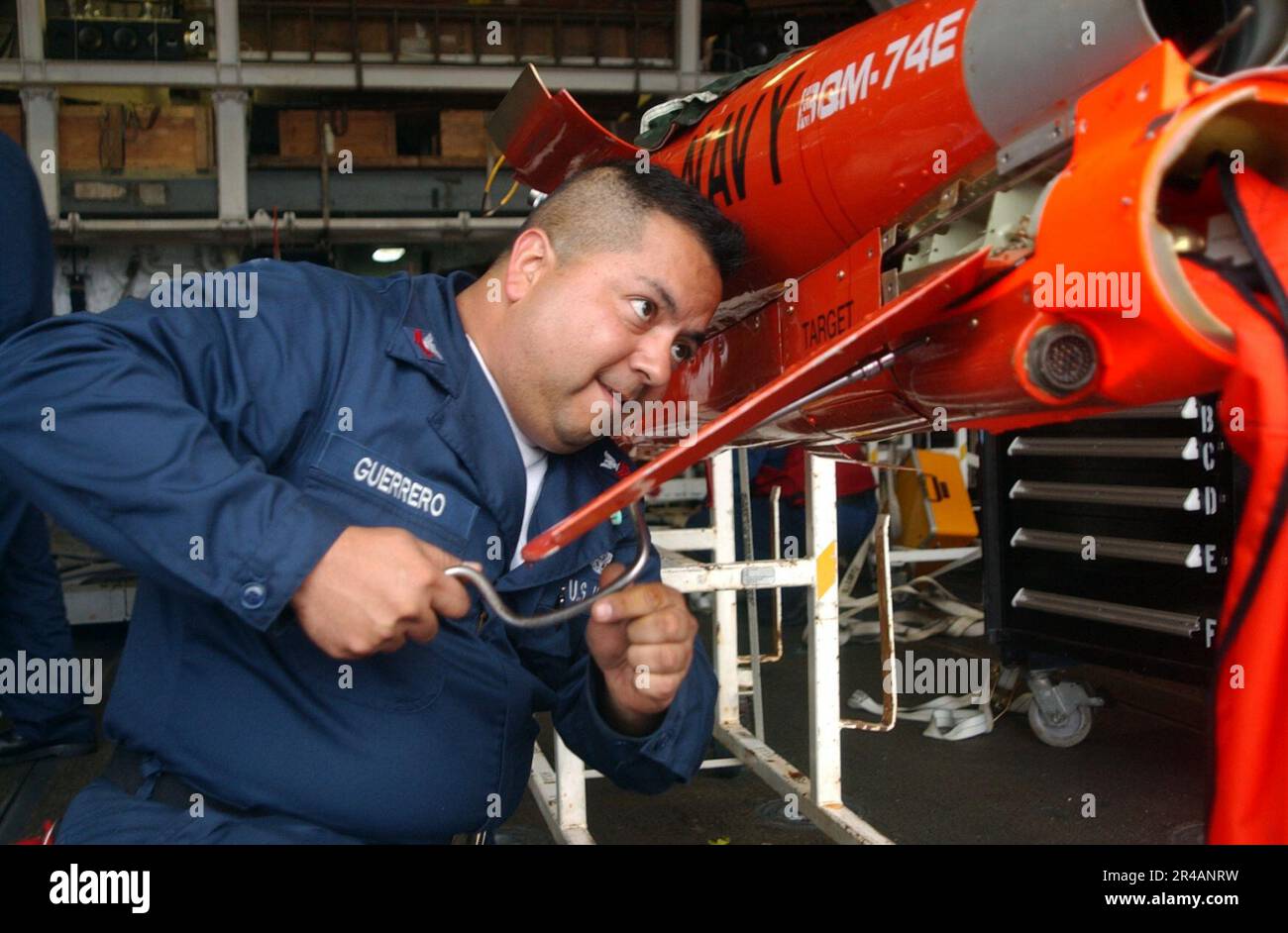 US Navy Guerrero of El Paso, Texas, conducts maintenance on a disabled ...