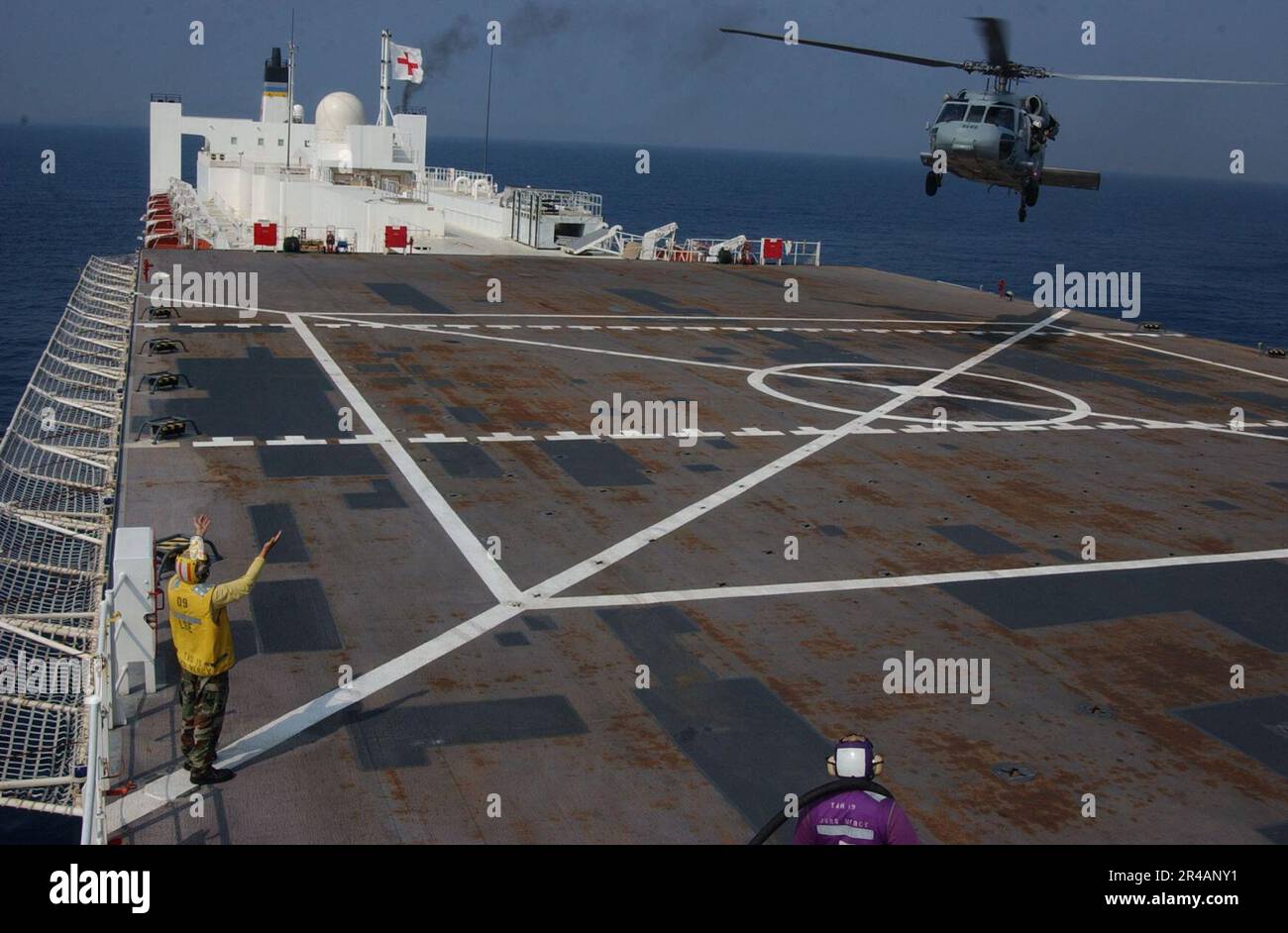 US Navy An MH-60S Seahawk prepares for a landing on the flight deck aboard the Military Sealift ...