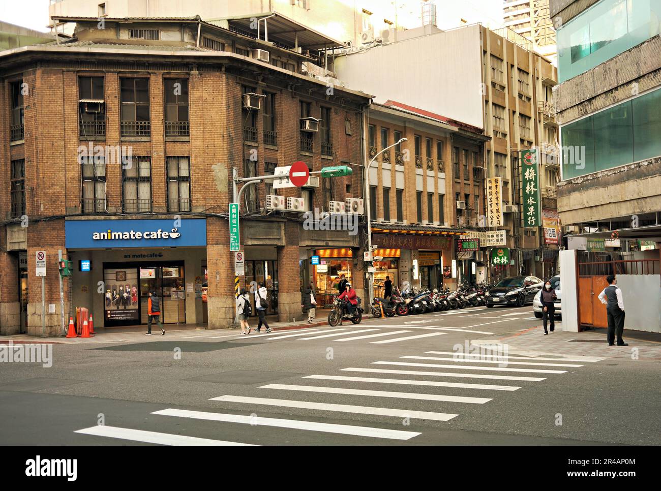A bustling city scene featuring a lively intersection, complete with ...
