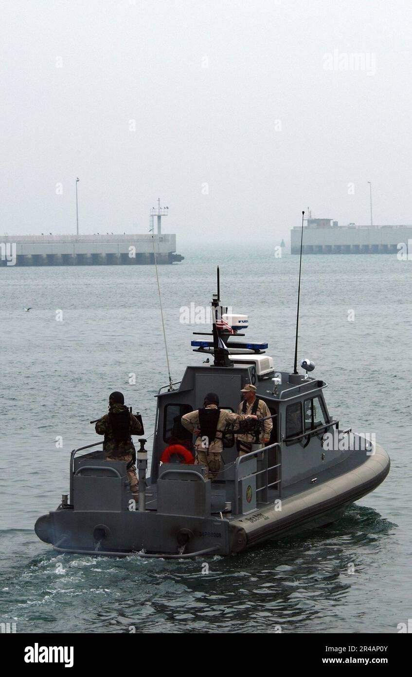 US Navy Personnel assigned to Inshore Boat Unit Two Two (IBU-22), Naval ...