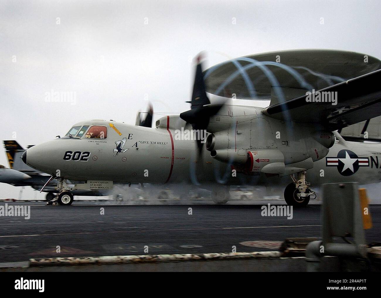 US Navy An E-2C Hawkeye launches from the flight deck of the Nimitz ...