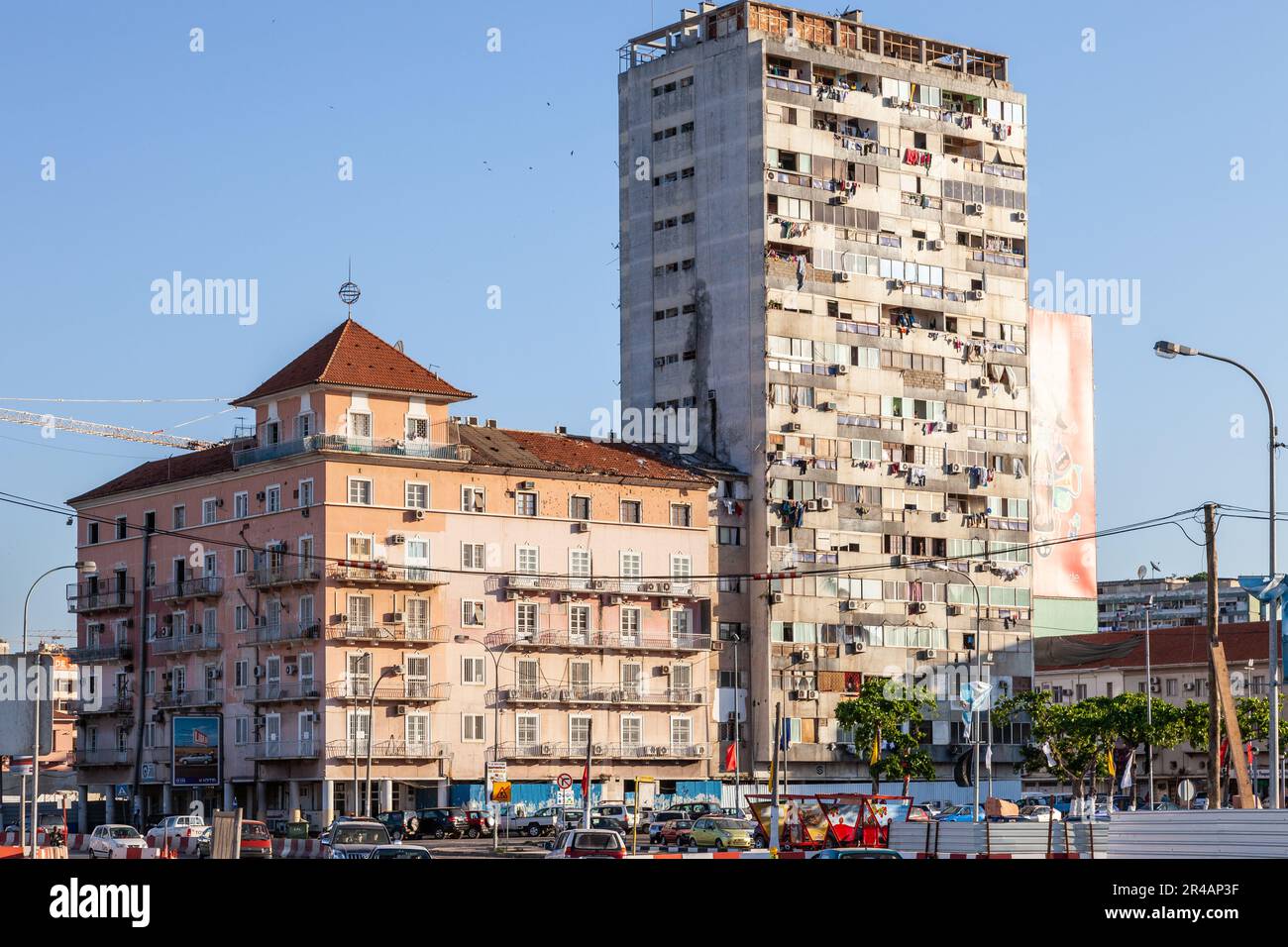 Two juxtaposed buildings, one a legacy of colonialism, the other an ...