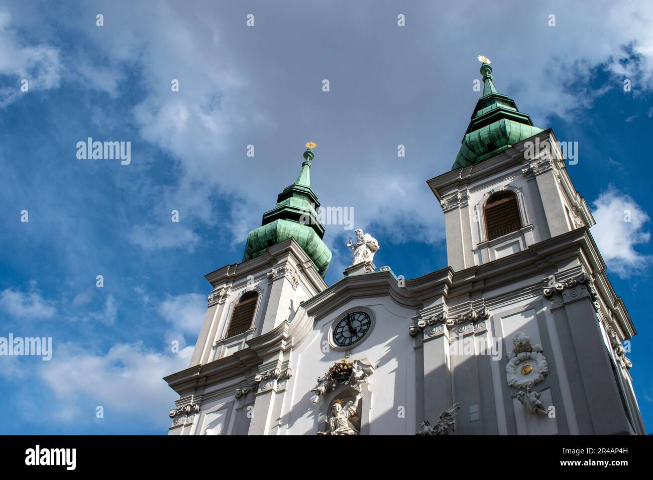 An aerial view of a majestic white edifice with two large towers and ...