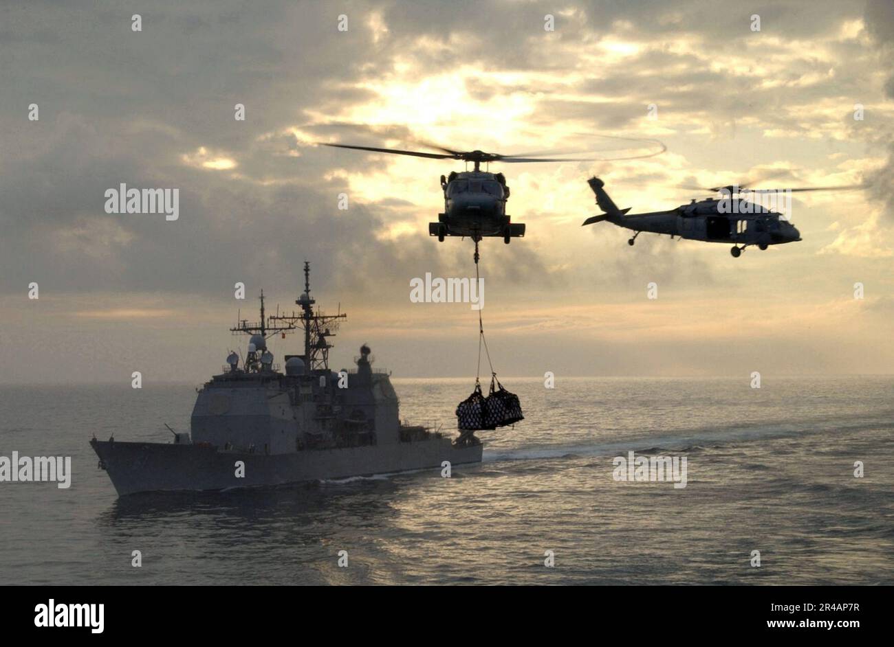 US Navy MH-60 Seahawks transport supplies from the Military Sealift ...