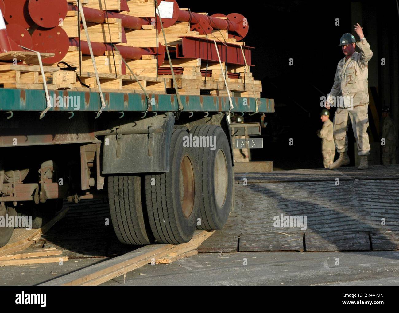 US Navy A Seabee, assigned to Naval Mobile Construction Battalion One ...