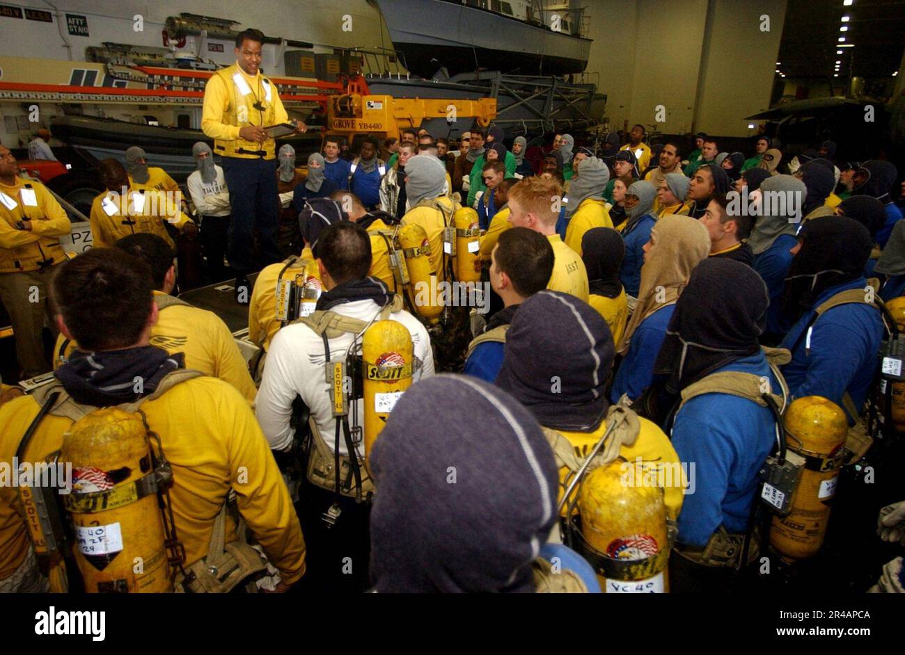 US Navy Aviation Boatswain's Mate 1st Class center, assigned to Air ...