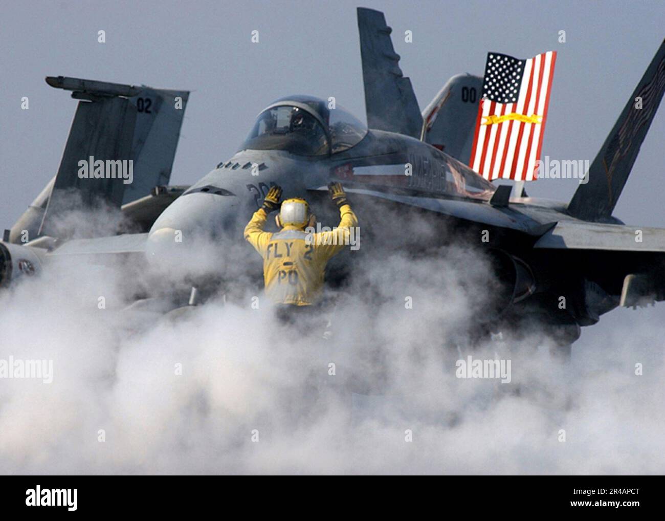 US Navy The pilot of an F-A-18A- Hornet conducts a check of his speed ...