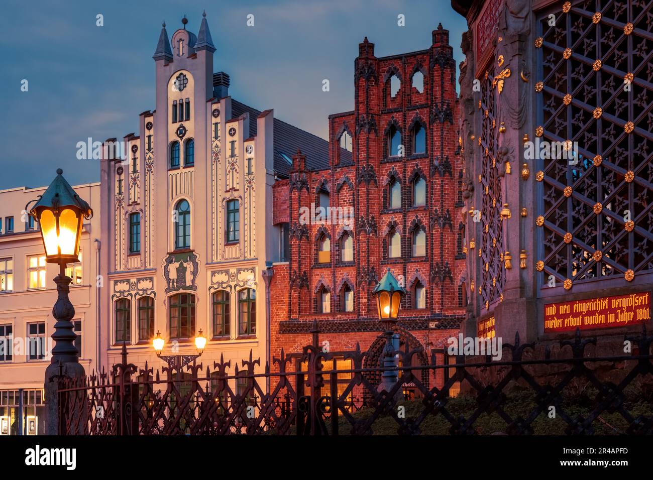 Market square of the Hanseatic city of Wismar with fountain water art ...