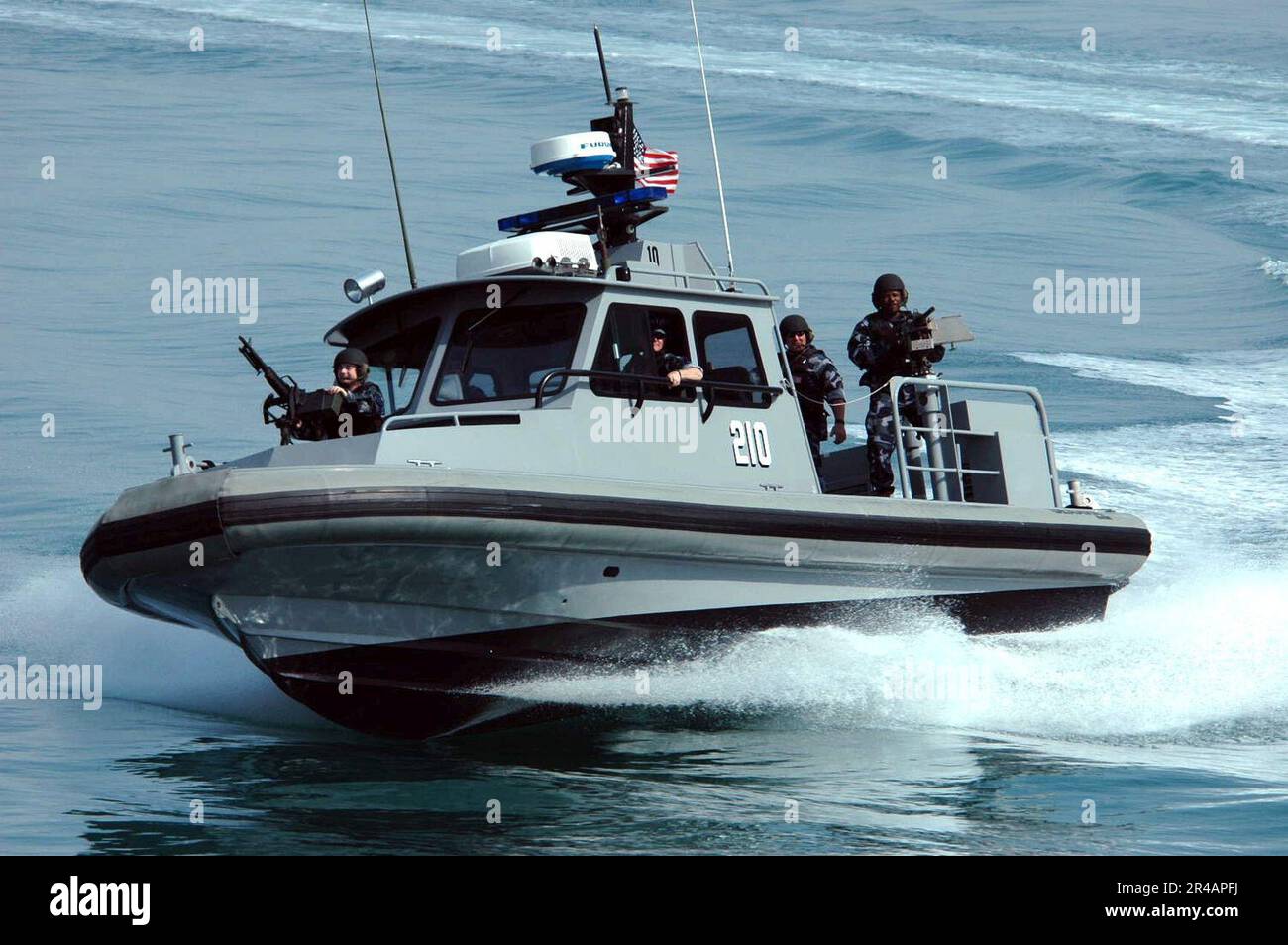 US Navy Sailors assigned to Inshore Boat Unit Two Four (IBU-24) conduct ...