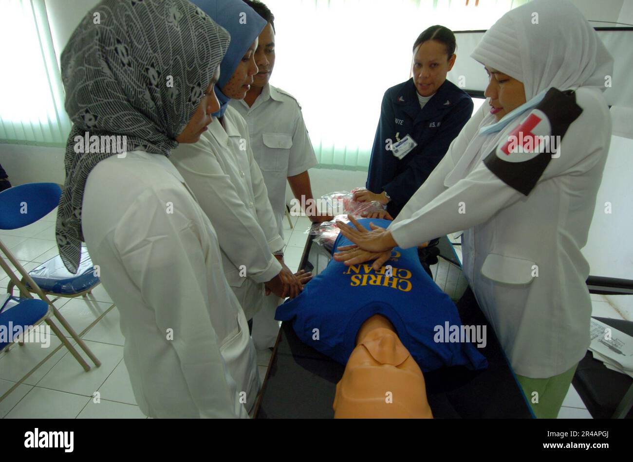 US Navy An Indonesian nurse practices cardio pulmonary resuscitation ...