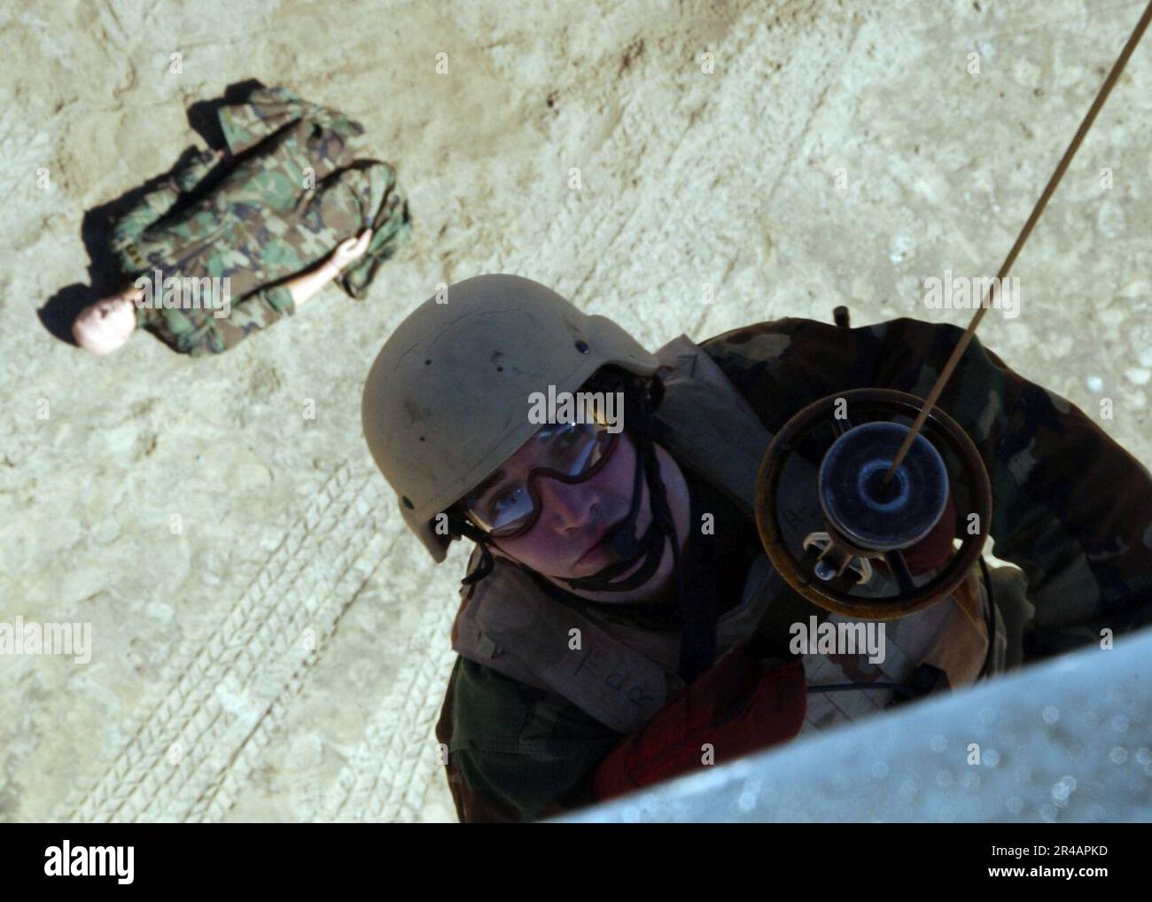 US Navy A member of Explosive Ordnance Disposal Mobile Unit Six (EODMU ...