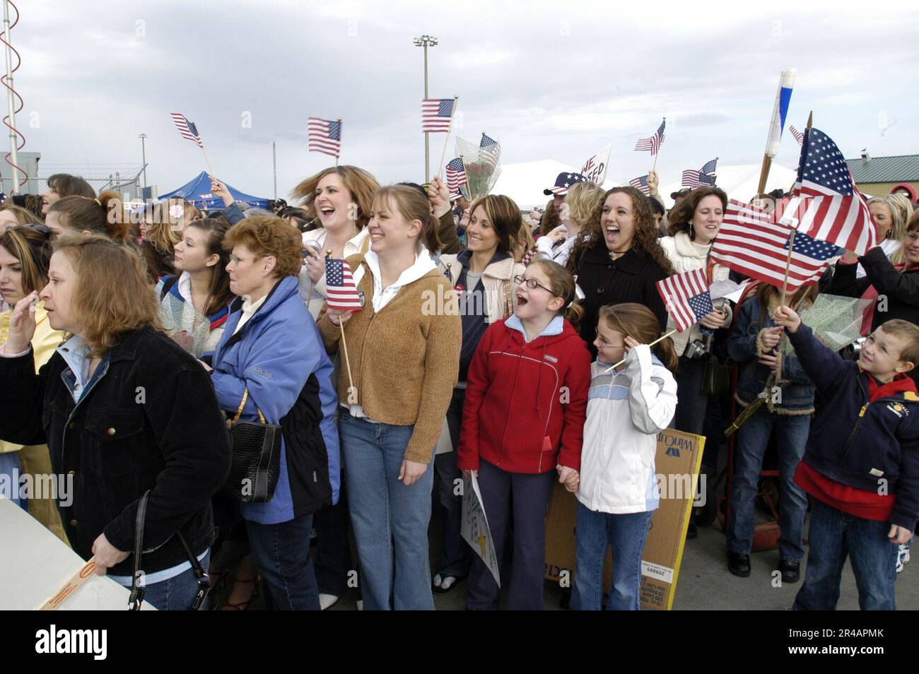 US Navy Friends and families of crew members assigned to the Nimitz ...