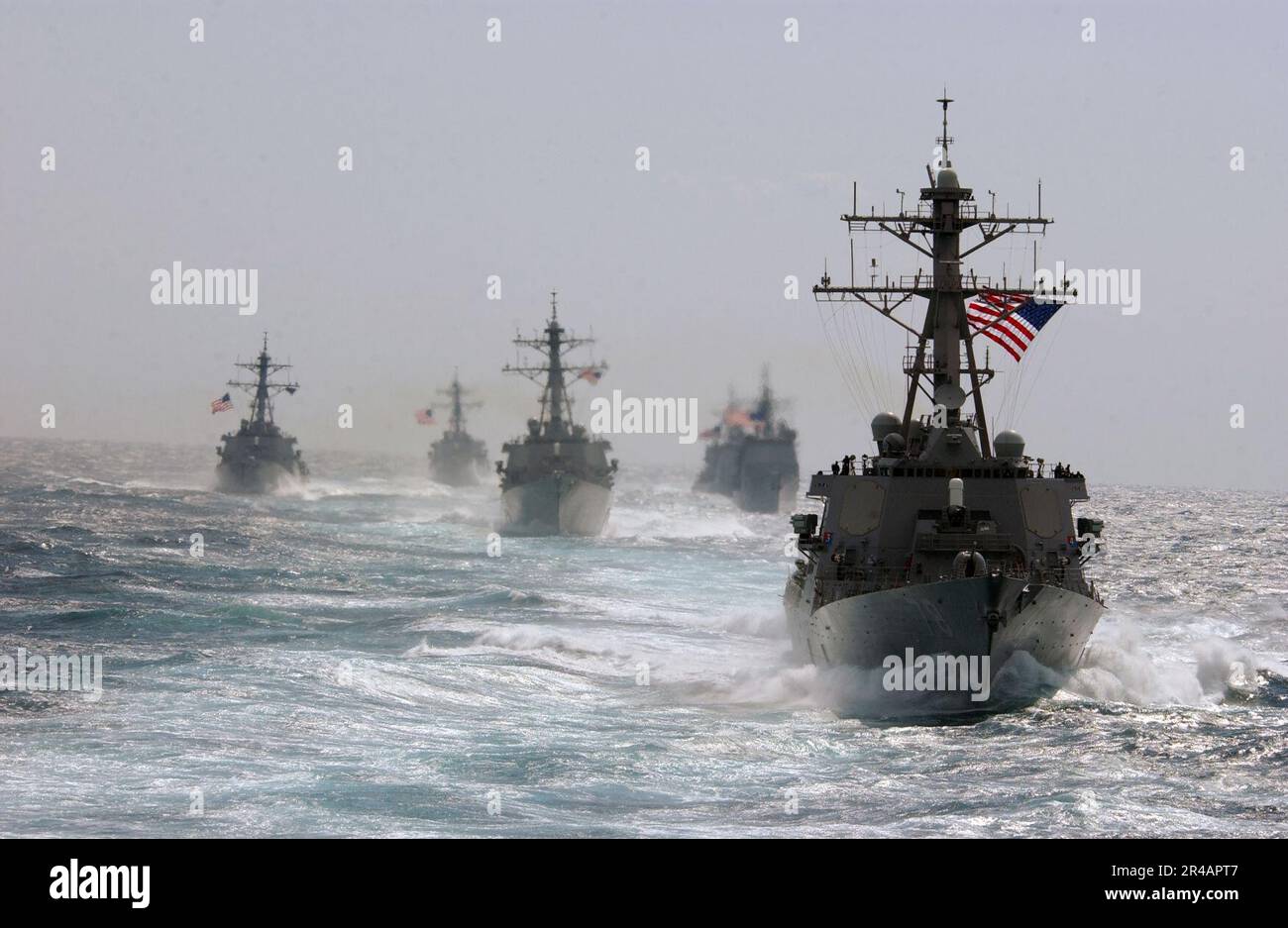 US Navy The guided missile destroyer USS Porter (DDG 78), right ...
