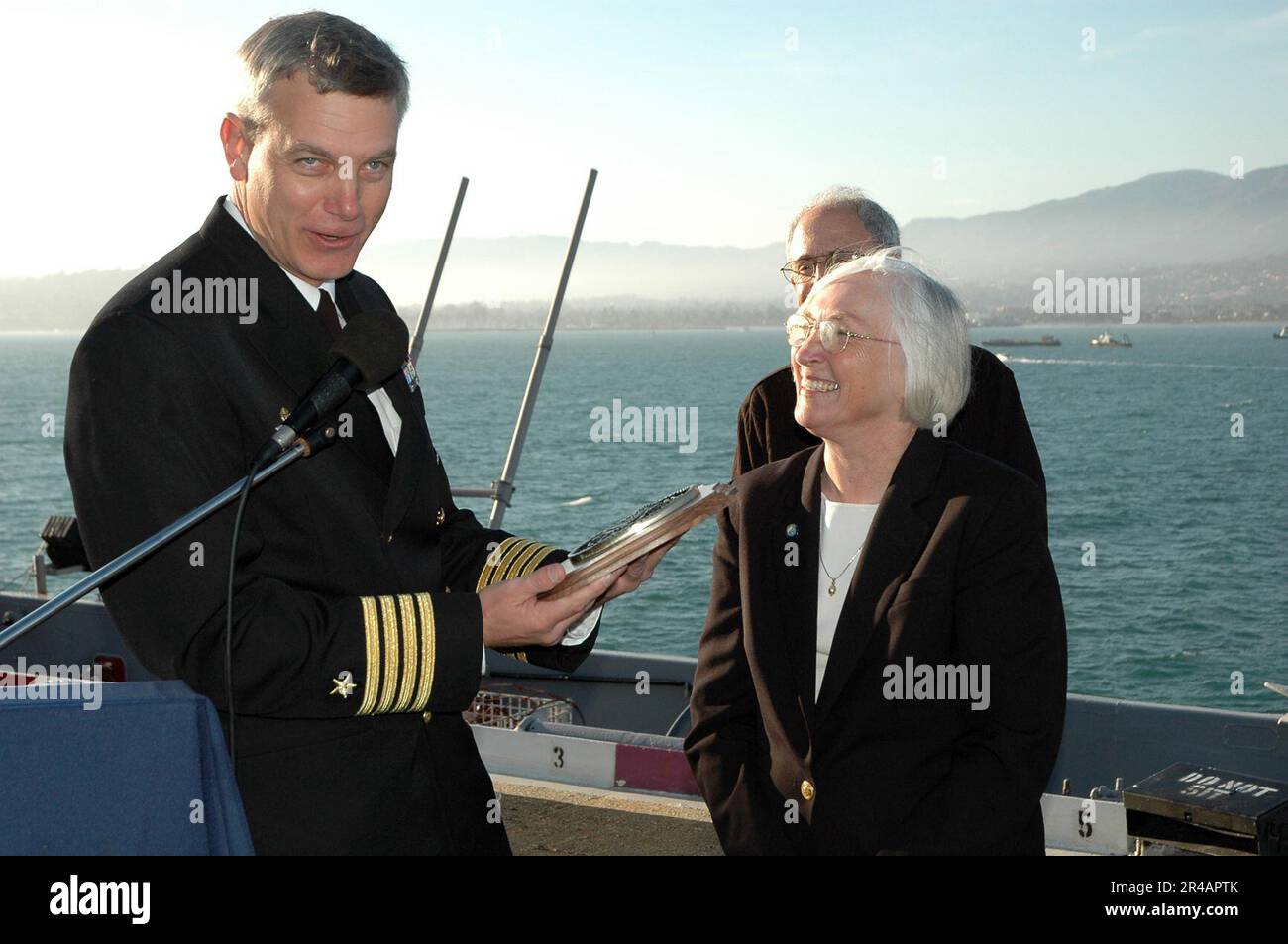 US Navy Commanding Officer, USS Denver (LPD 9), presents Santa Barbara ...