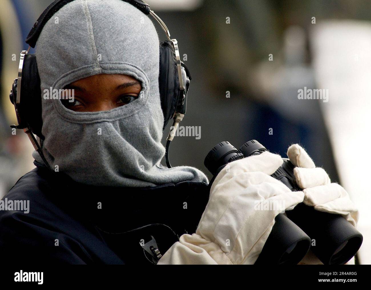 US Navy Operations Specialist Seaman stands a force protection watch on ...