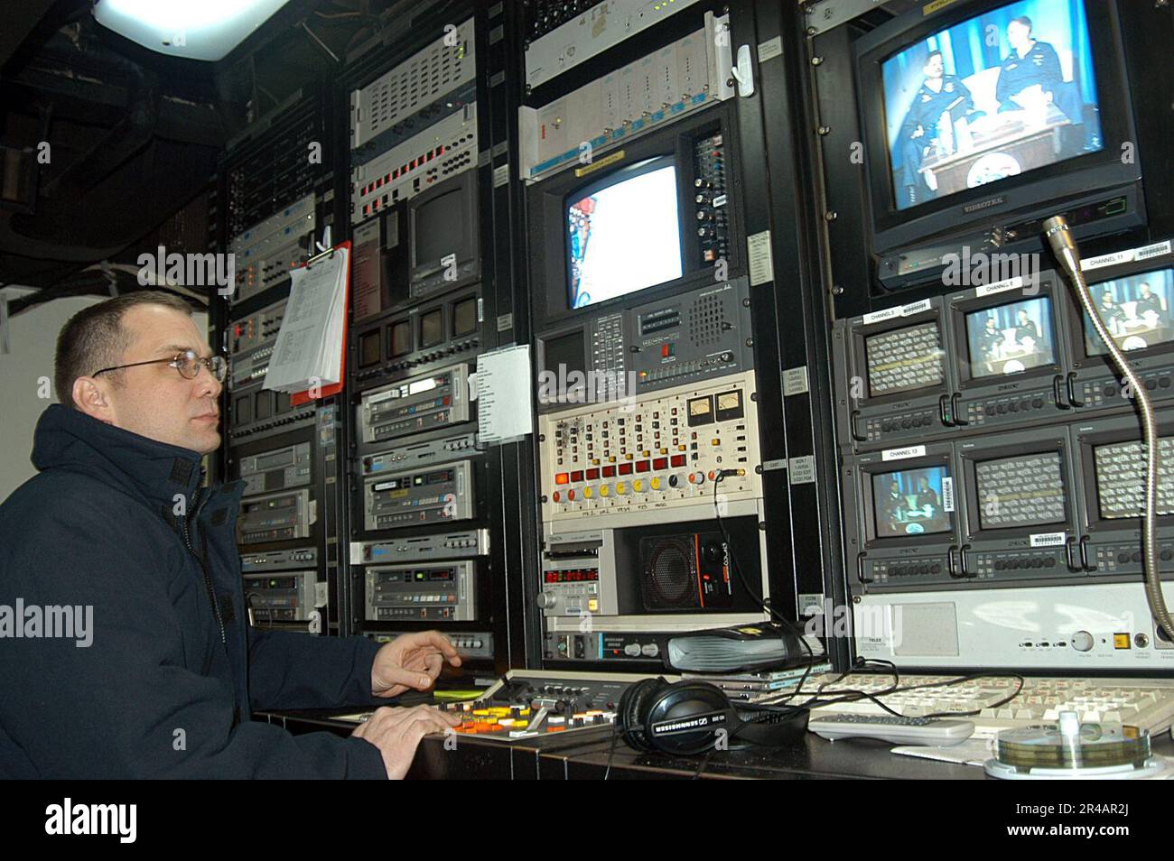 US Navy Journalist 1st Class directs the daily morning television ...
