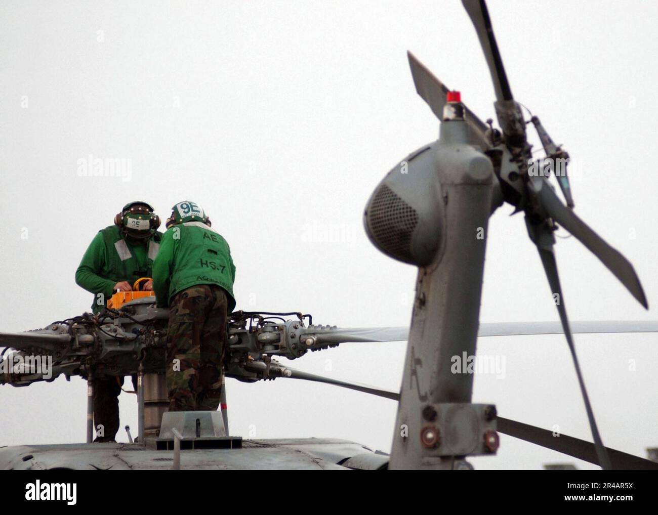 US Navy Maintainers, assigned to the Dusty Dogs of Helicopter Anti ...