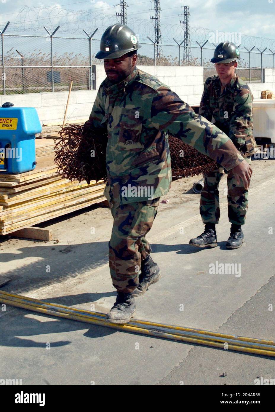 US Navy Builder 3rd Class and Steelworker 3rd Class both assigned to ...
