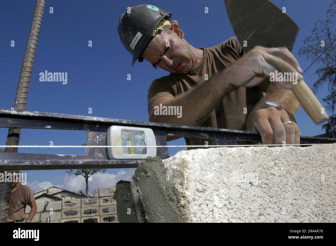 US Navy Builder 2nd Class assigned to Naval Mobile Construction ...