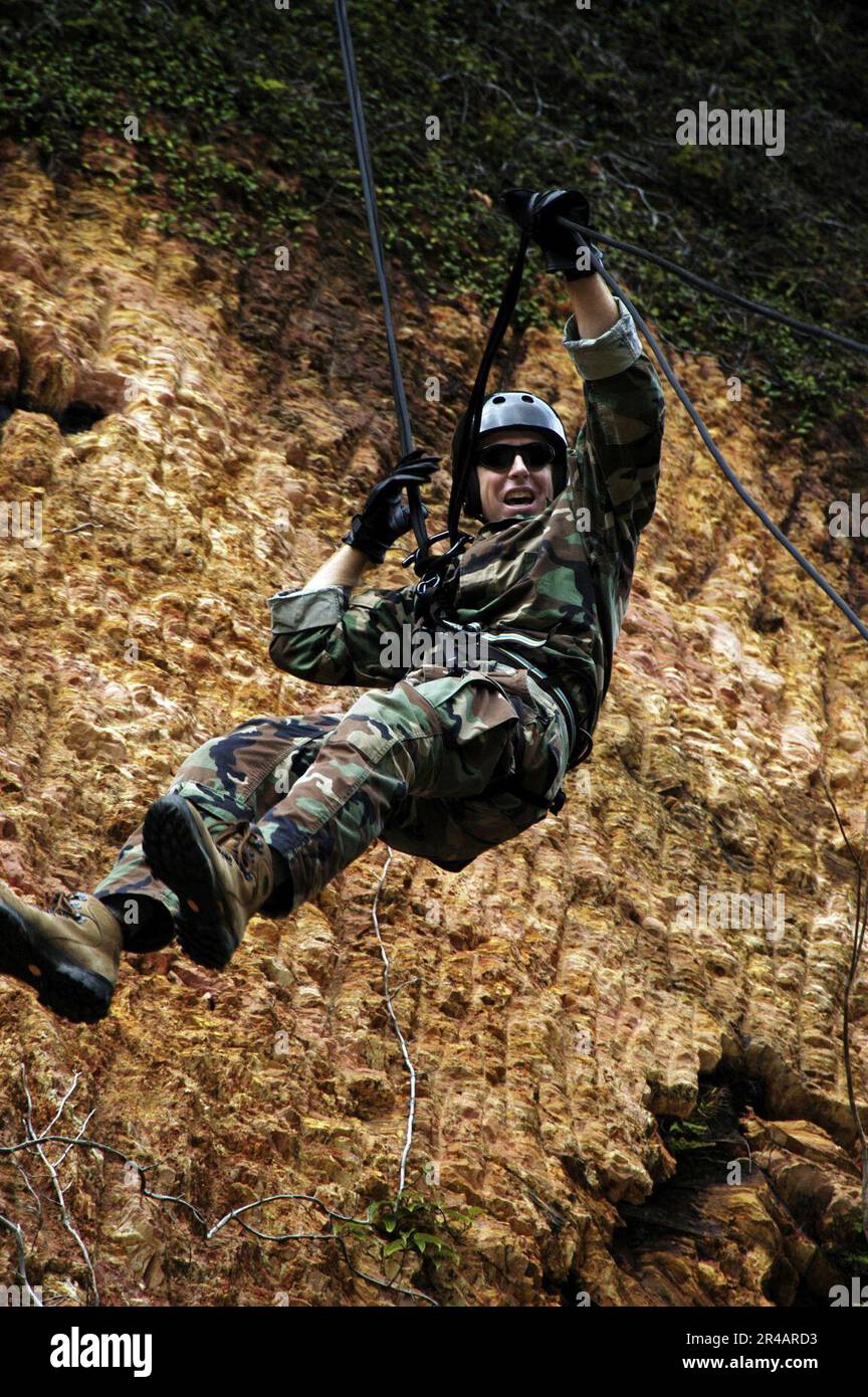 US Navy Lt. assigned to Explosive Ordnance Disposal Mobile Unit Five ...