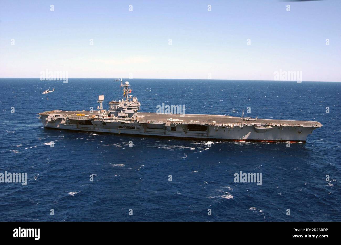 US Navy USS John F. Kennedy (CV 67) conducts vertical replenishment ...