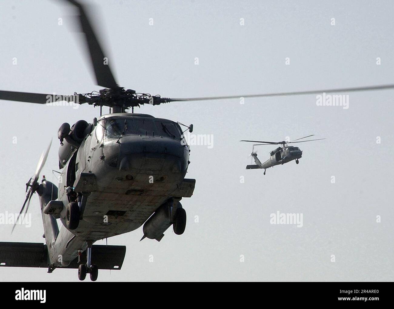 US Navy An SH-60F Seahawk prepares to land on the flight deck of USS ...