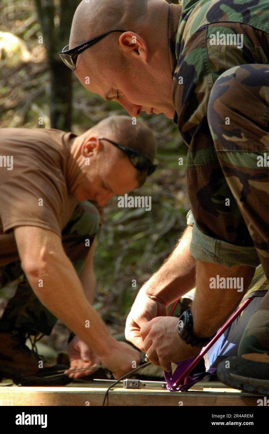 US Navy Aviation Ordnanceman 1st Class right, and Aviation Ordnanceman ...