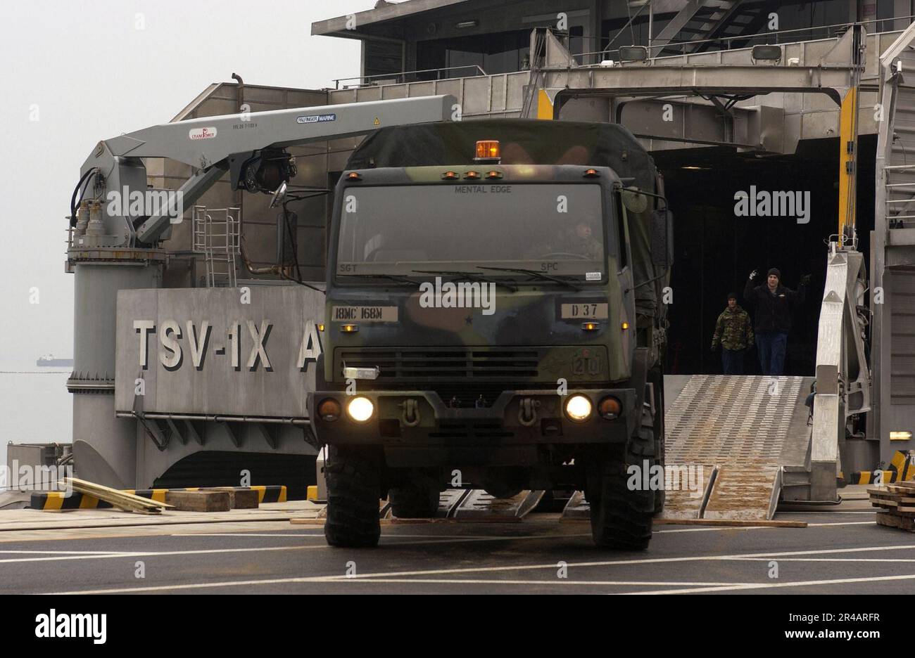 US Navy A U.S. Army Light Medium Tactical Vehicle is loaded onto the U ...