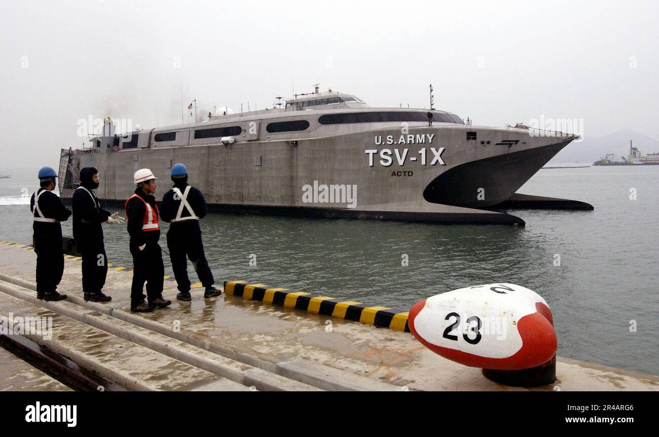 US Navy Korean contractors watch from shore as U.S. Army Theater ...