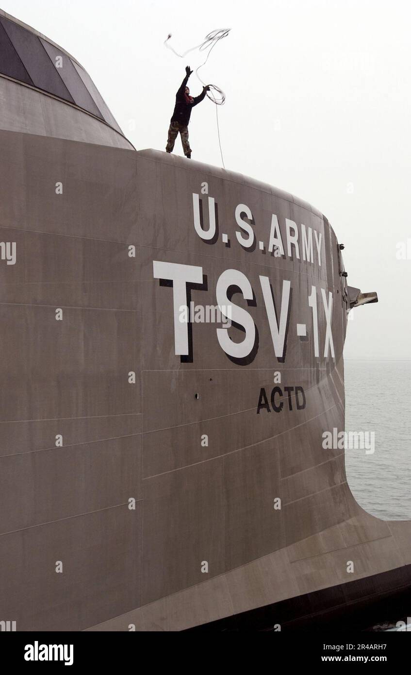 US Navy A U.S. Army 469th Transportation Detachment crew member ...