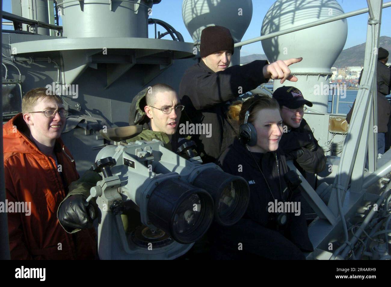 US Navy Sailors stand the forward lookout watch from the signal bridge ...