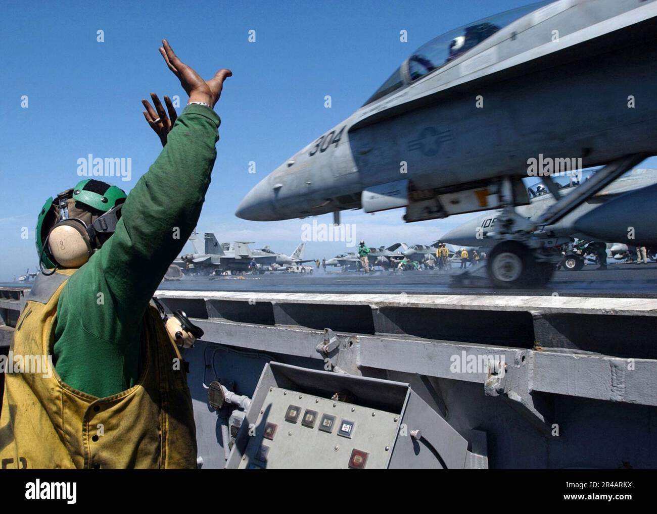 US Navy Aviation Boatswain's Mate 2nd Class assigned to the Air ...