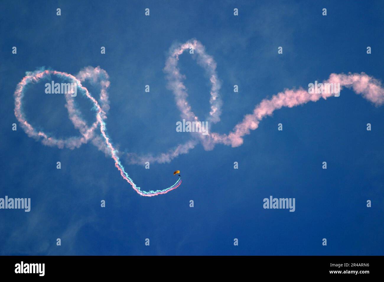 US Navy A Sailor assigned to the U.S. Navy Leap Frogs parachute team ...