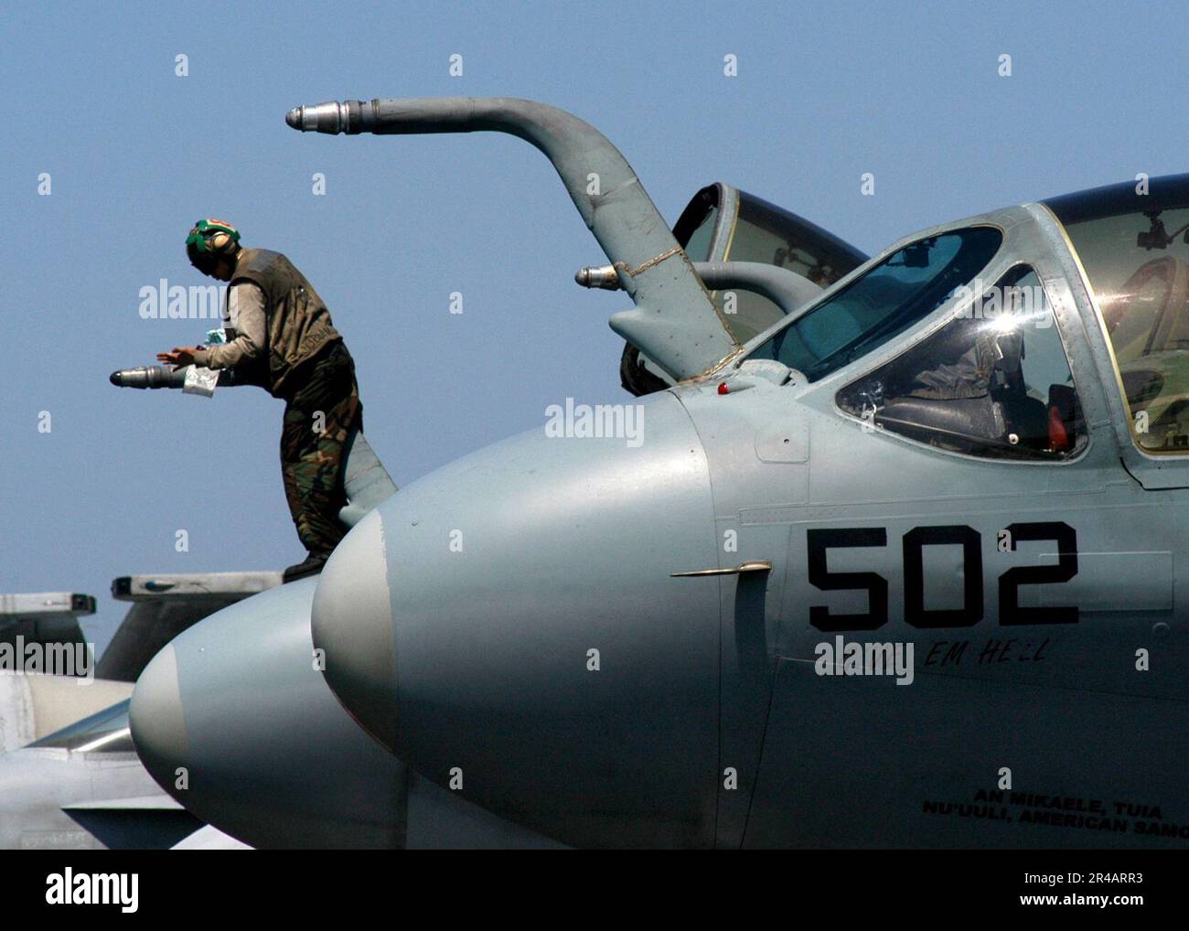 US Navy A Sailor assigned to the Zappers of Electronic Attack Squadron ...