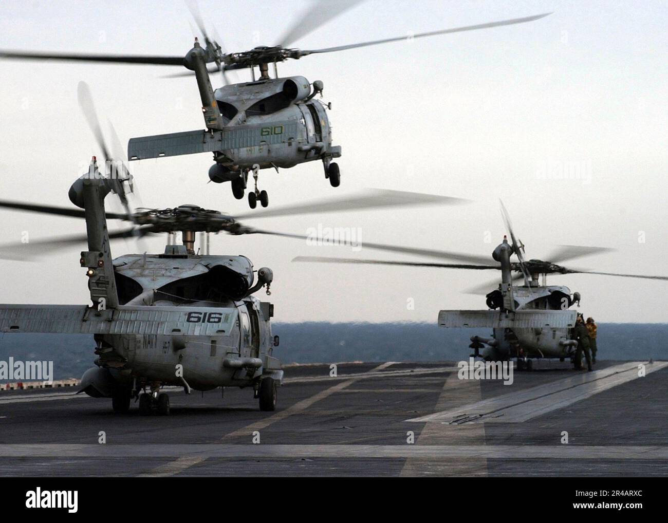 US Navy An SH-60F Seahawk lifts off from the flight deck of the Nimitz ...