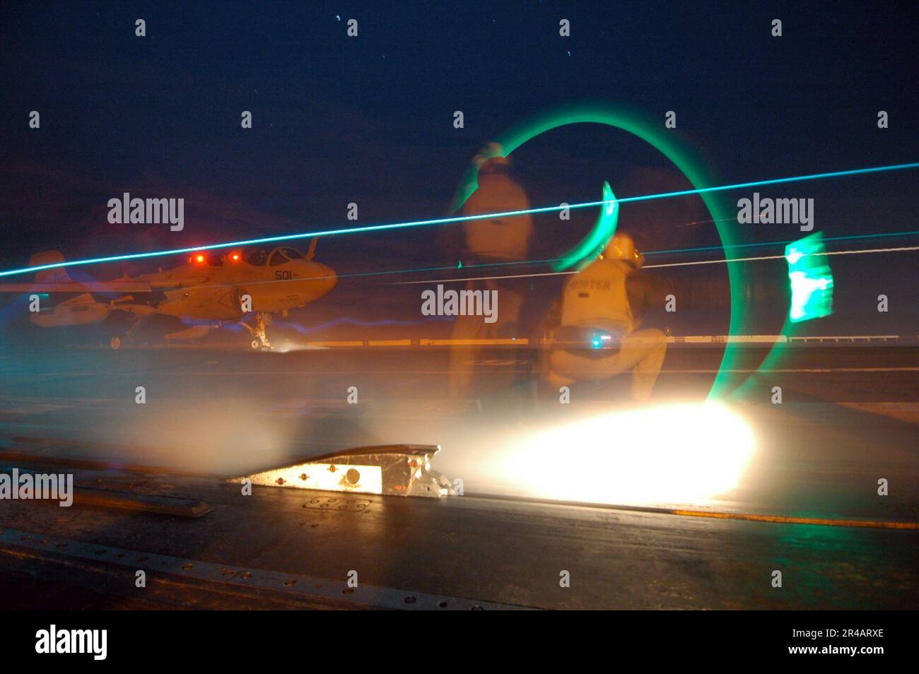US Navy A catapult shooter gives the signal to launch an EA-6B Prowler ...