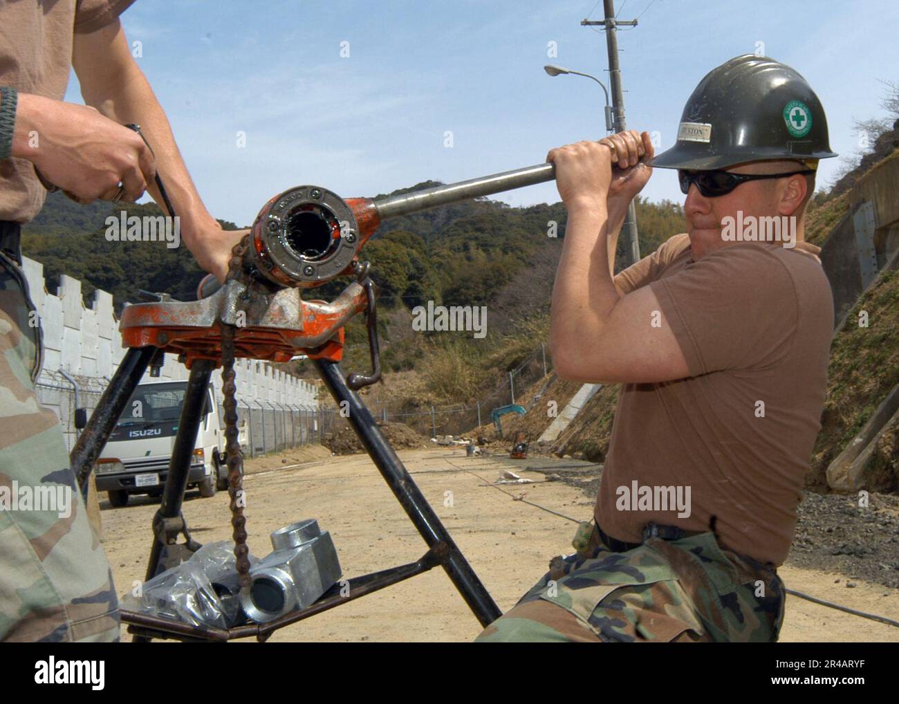 Us Navy Construction Electrician 3rd Class Assigned To Naval Mobile Construction Battalion Four