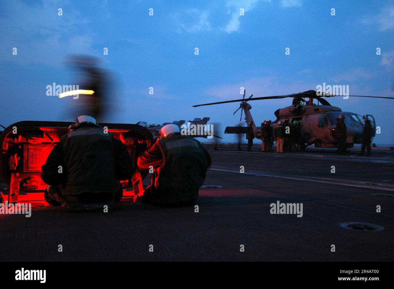 US Navy Two Sailors assigned to the Air Department run through a ...