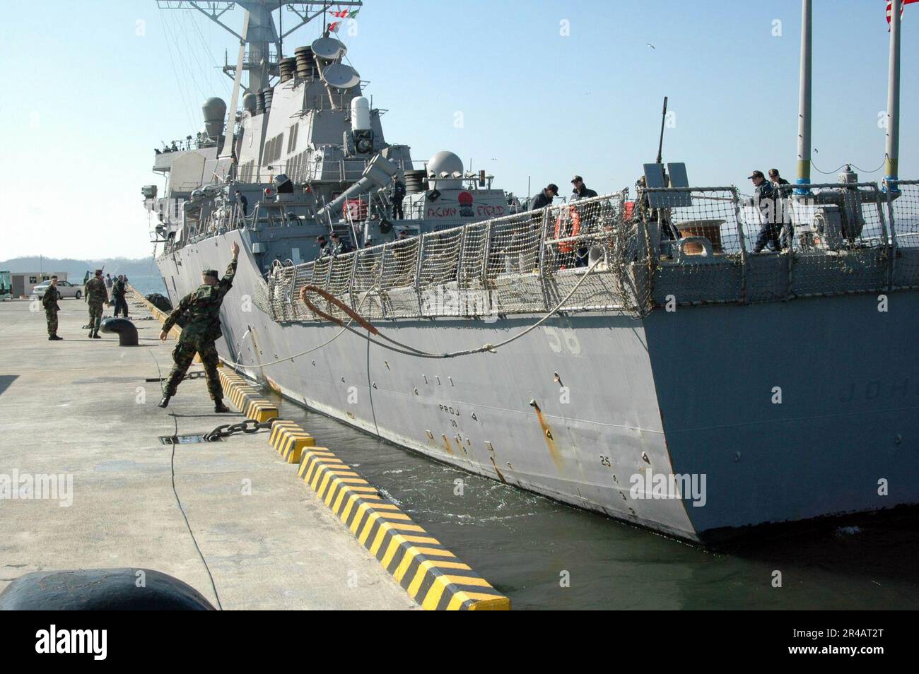 US Navy Sailors aboard the guided missile destroyer USS John S. McCain ...