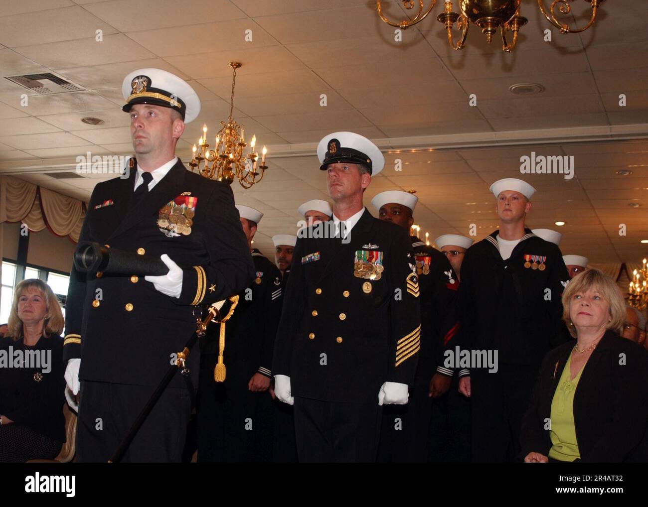 US Navy Crew members of the destroyer USS Spruance (DD 963) participate in the ship's ...