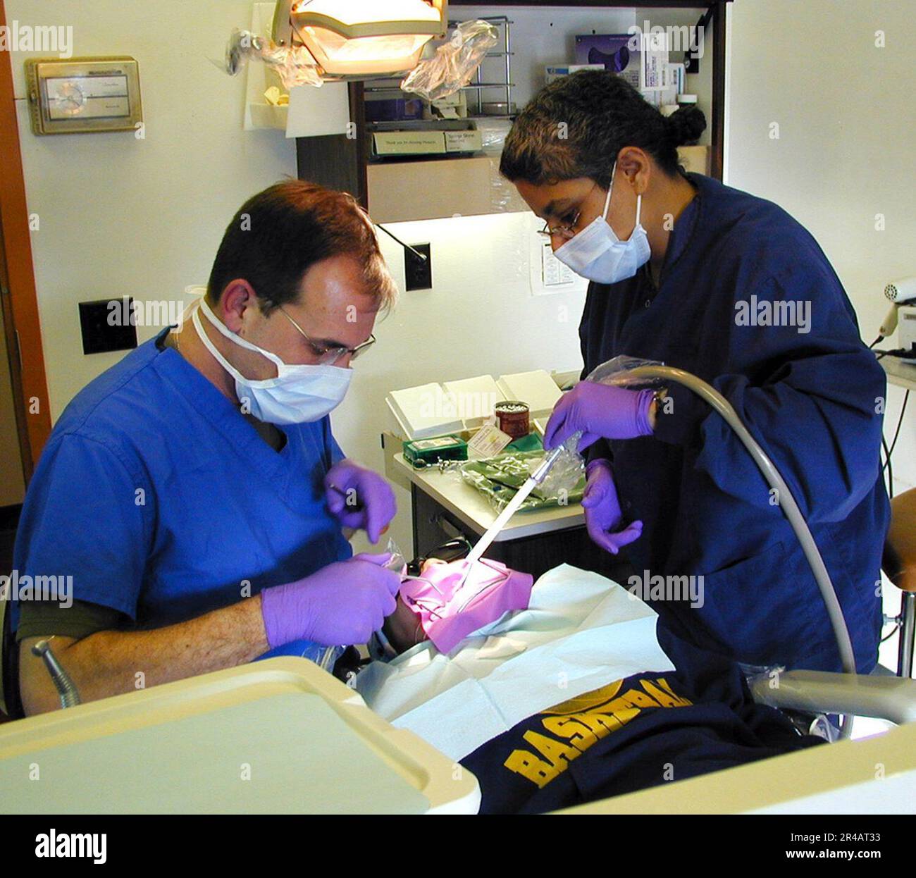 US Navy Navy Reserve Cmdr. a Naval Reservist pediatric dentist assigned ...