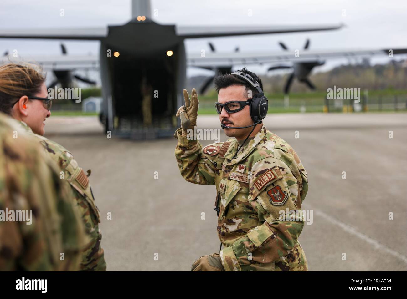 U.S. Air Force Senior Master Sgt. Joseph Valenzuela, right, 445th ...