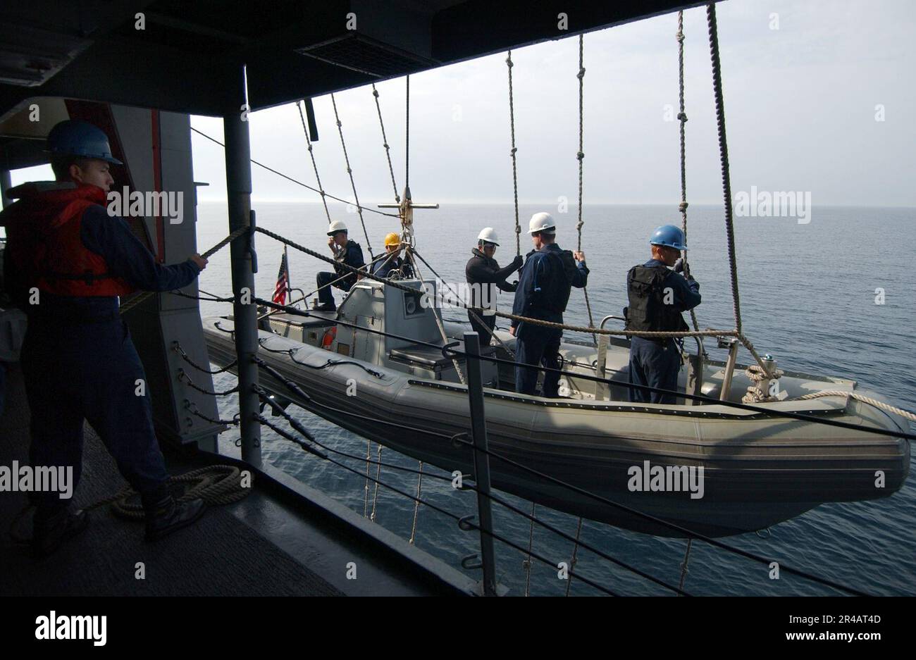 US Navy Seaman assigned to the guided missile frigate USS Thach (FFG 43 ...